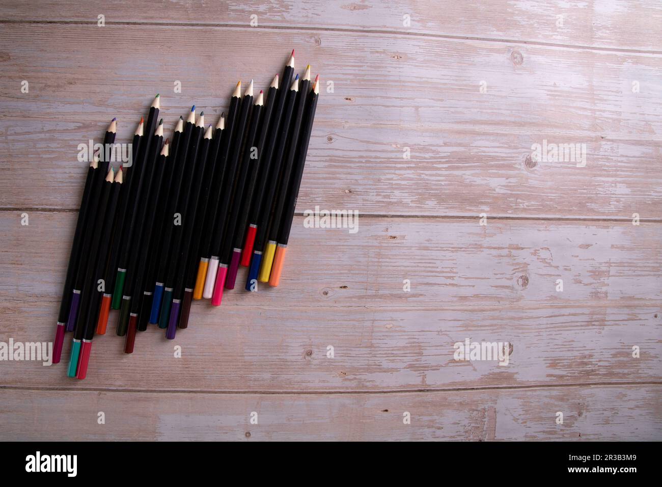 photo many drawing pencils on the table top view Stock Photo - Alamy