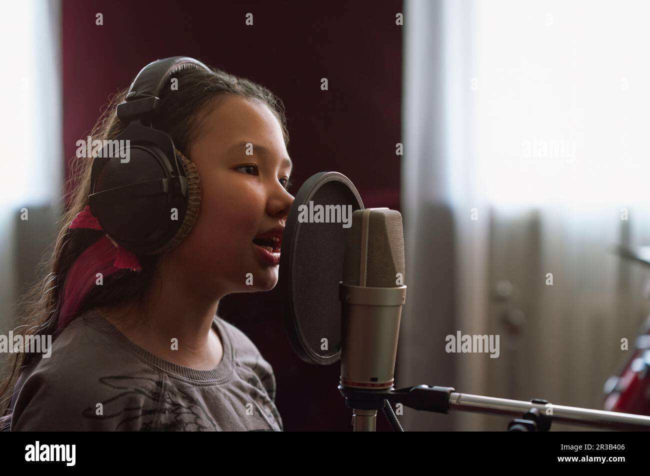 Female musician recording song hi-res stock photography and images - Alamy