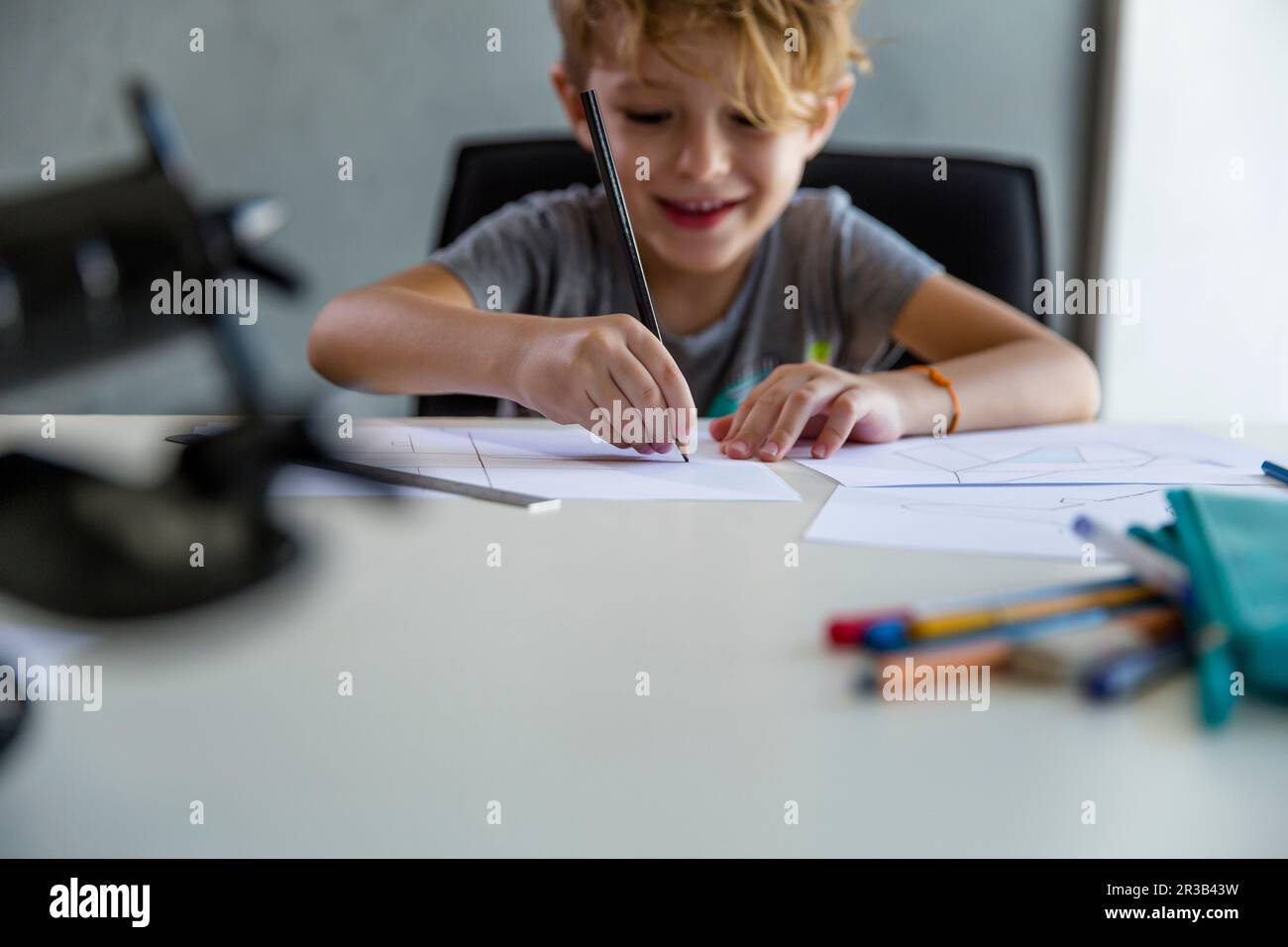 Boy drawing desk hi-res stock photography and images - Alamy