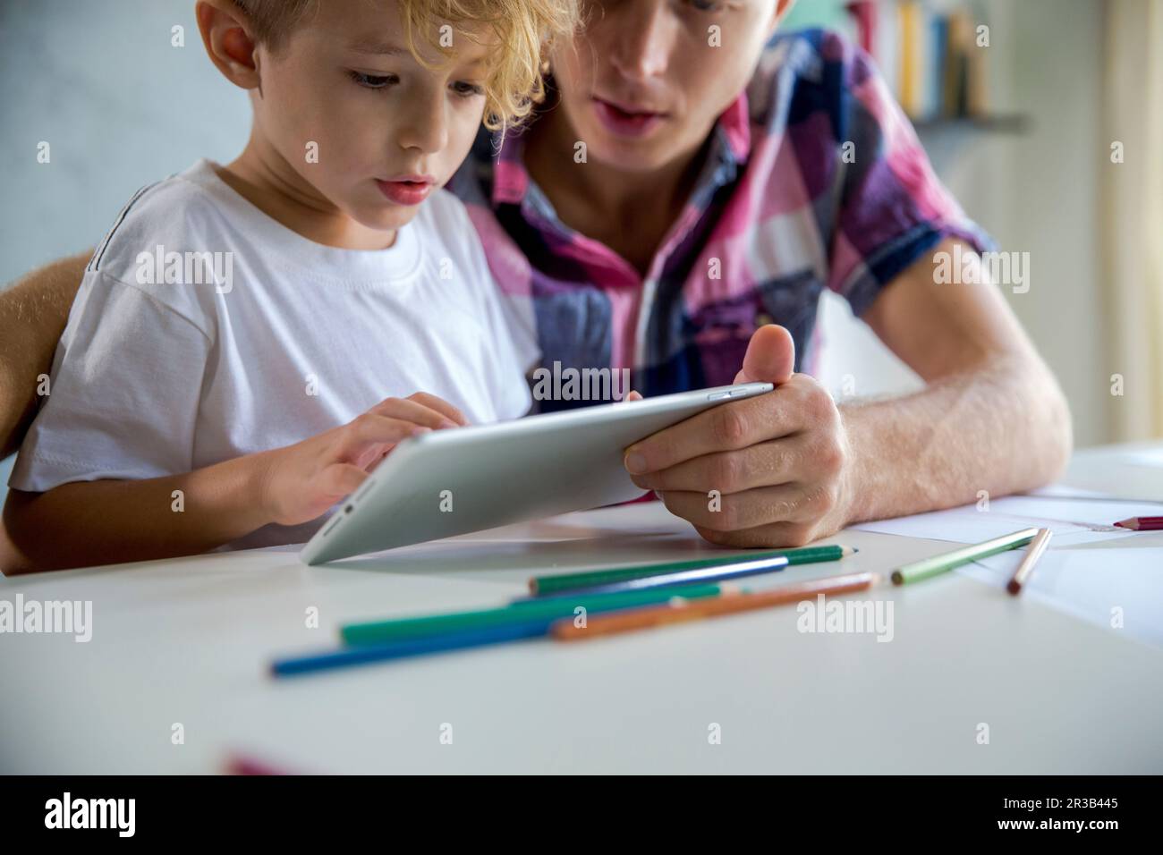 Father son desk hi-res stock photography and images - Alamy