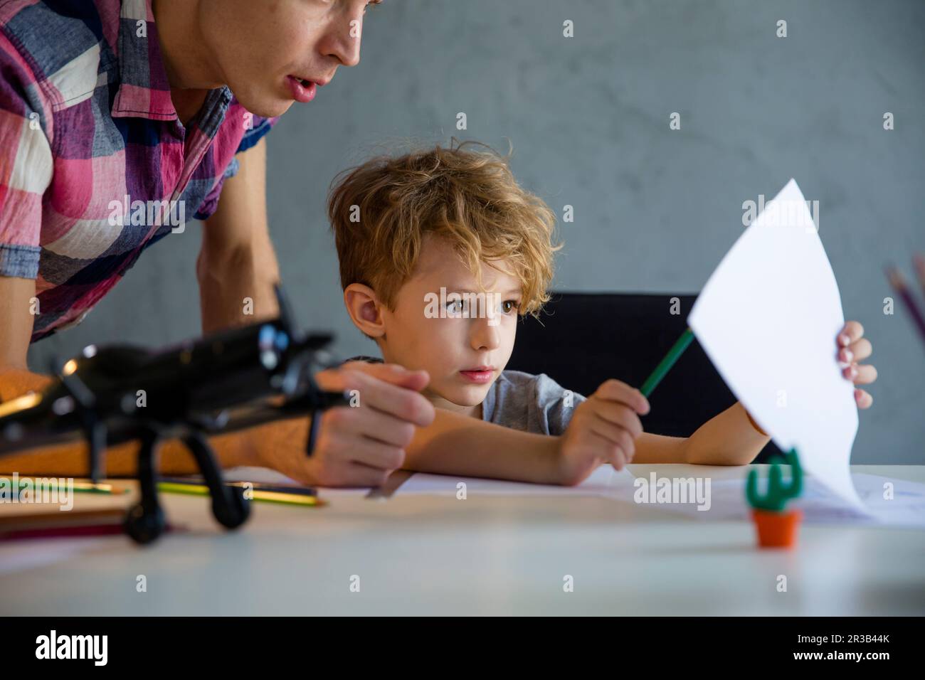 Father son desk hi-res stock photography and images - Alamy