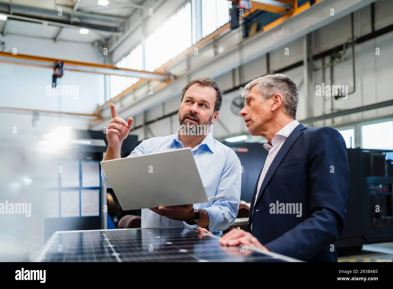 Manager pointing at computer hi-res stock photography and images - Alamy