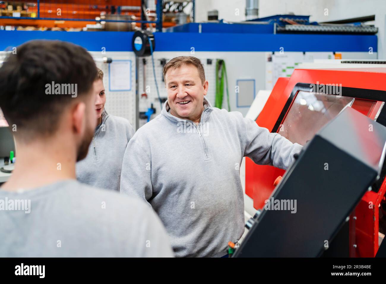 Employee and machine hi-res stock photography and images - Alamy