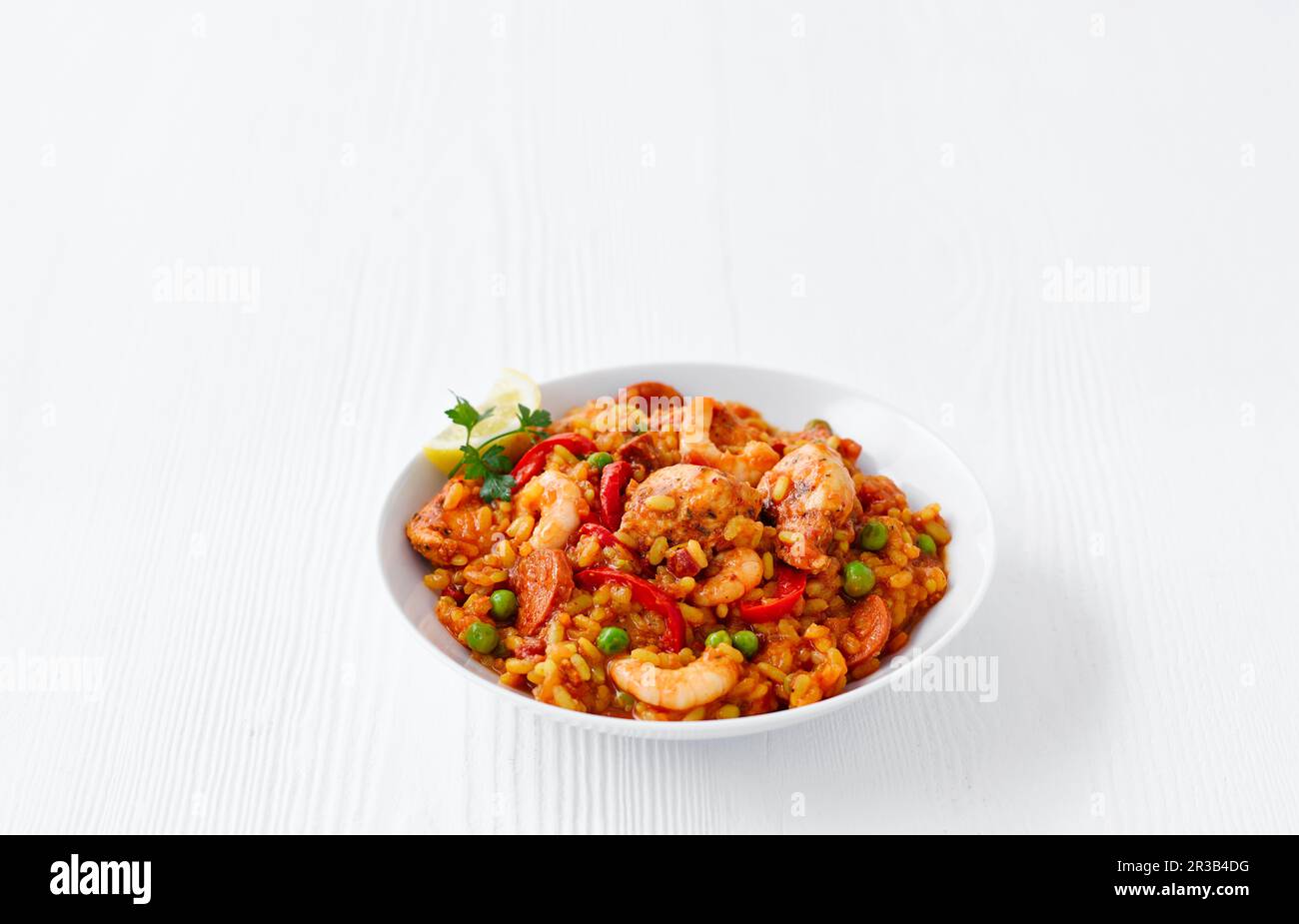 Chicken and King Prawn Paella Stock Photo - Alamy