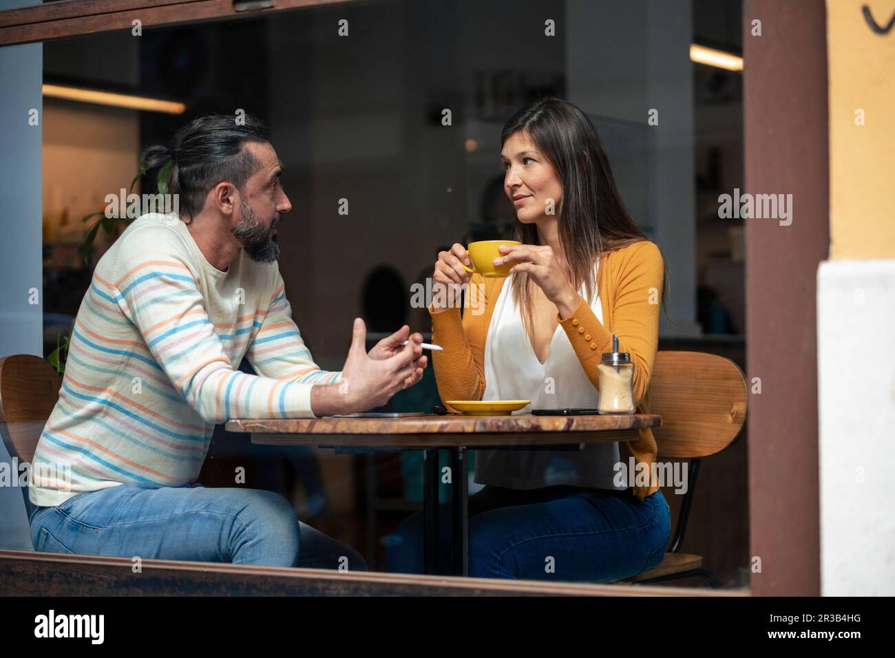 Man seen holding cup hi-res stock photography and images - Alamy