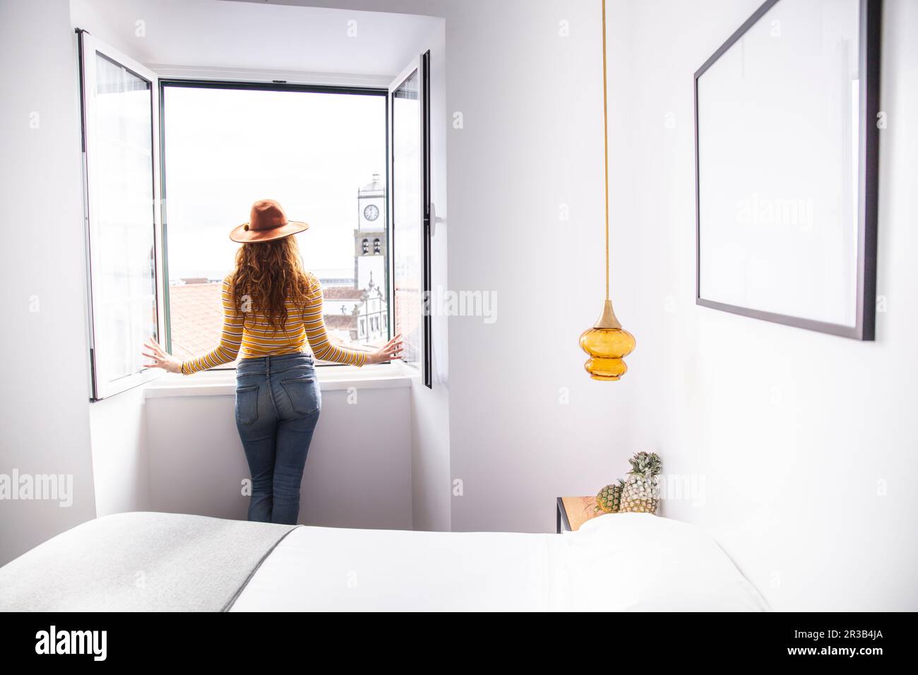 Hanging out of the window hi-res stock photography and images - Alamy