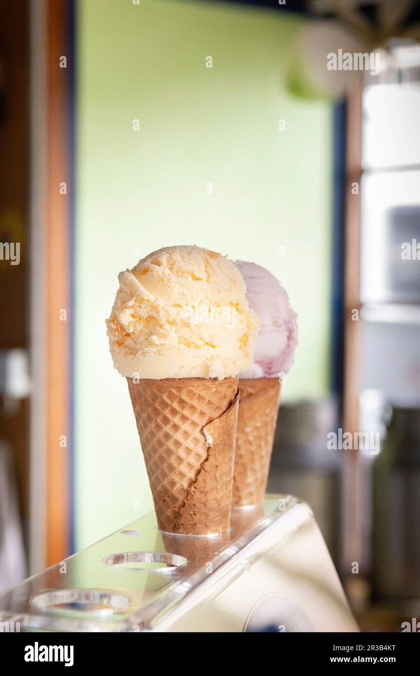 Vanilla ice cream in a cone hi-res stock photography and images - Alamy