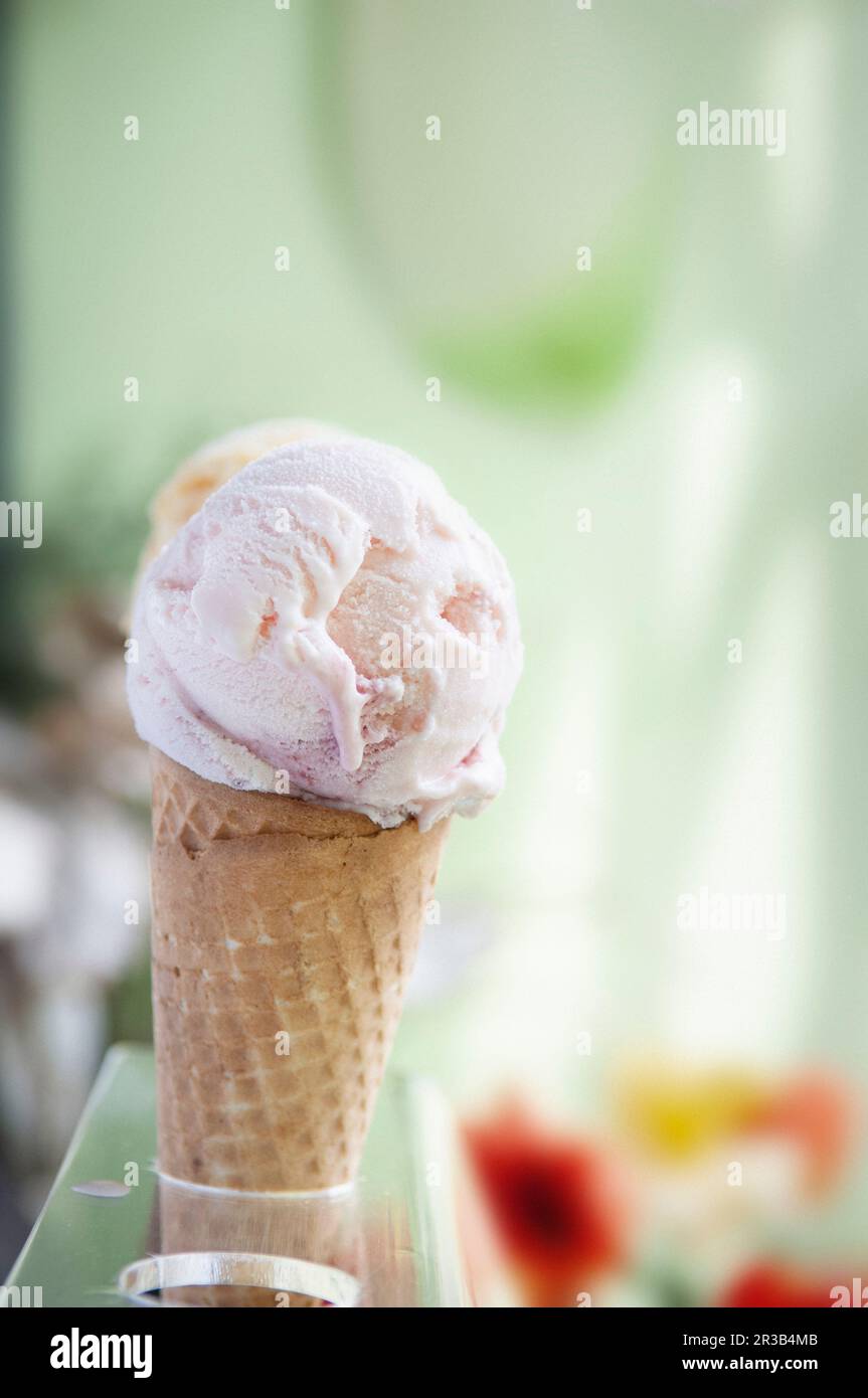 Berry ice cream in a cone Stock Photo - Alamy