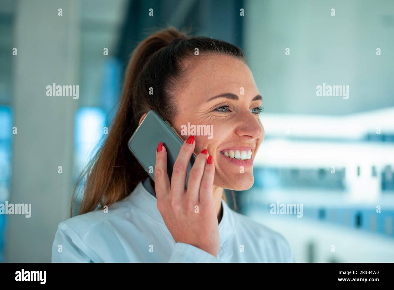 Caucasian young female doctor talking hi-res stock photography and ...