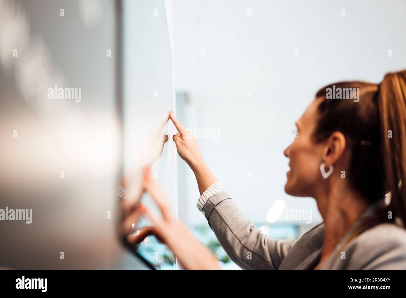 Using touch display hi-res stock photography and images - Alamy