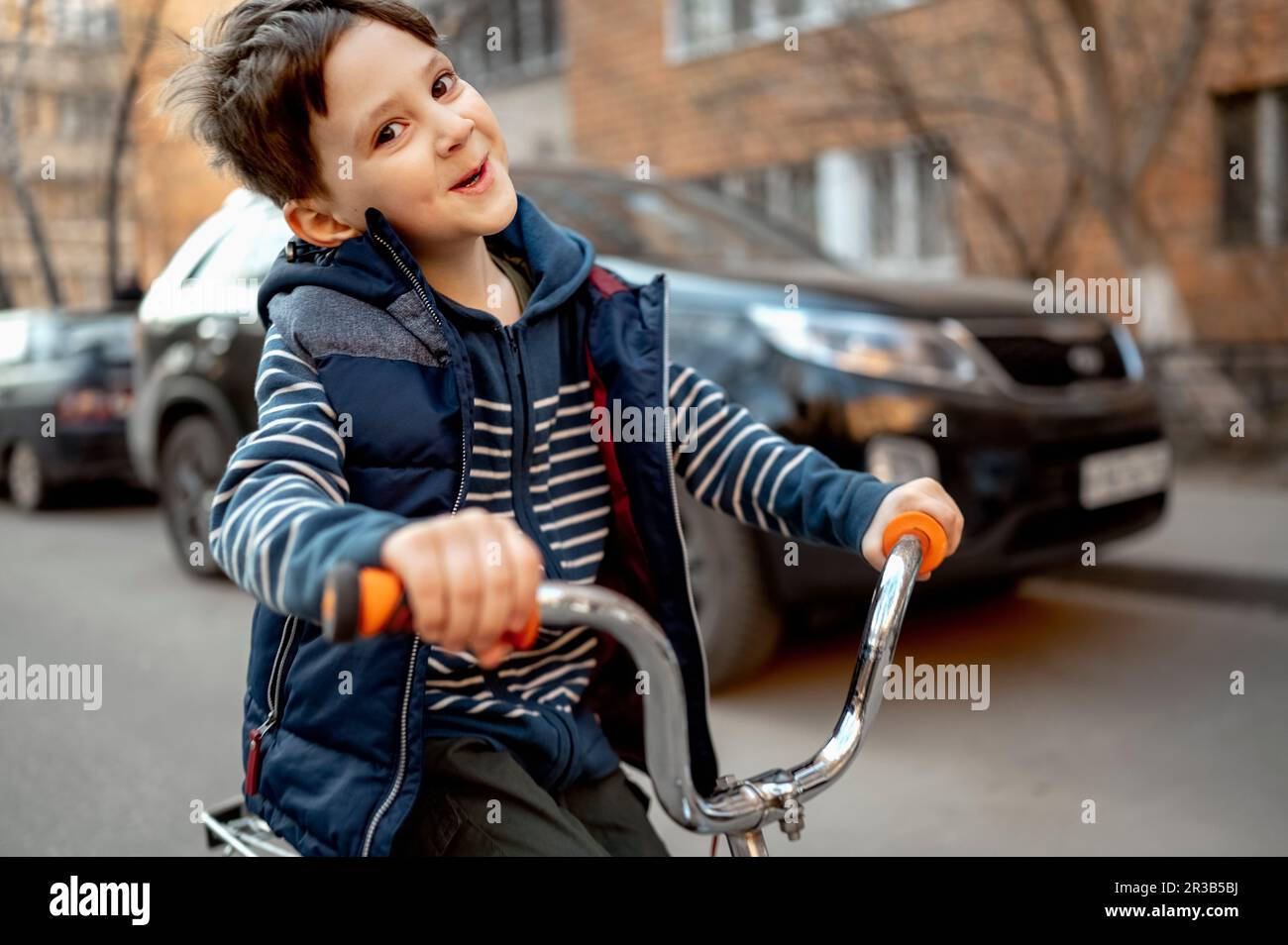 Boy at bicycle hi-res stock photography and images - Alamy