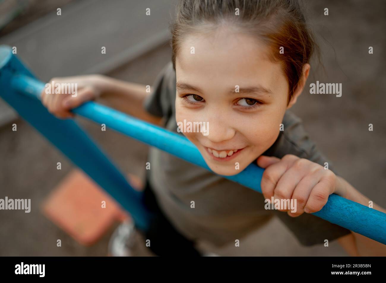 Child climbing on bars hi-res stock photography and images - Alamy