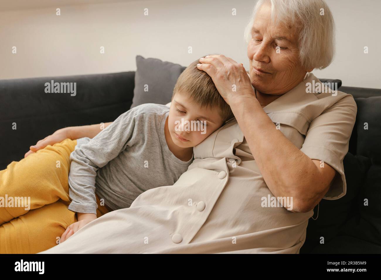 Children grandparents sleep sofa hi-res stock photography and images ...