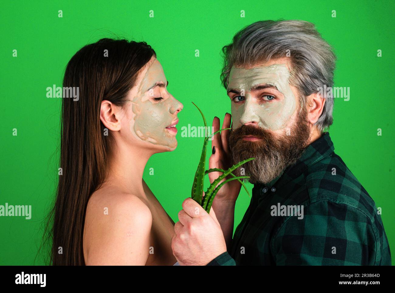 Couple spa mask, beauty concept healthy portrait. Mud facial mask, face ...