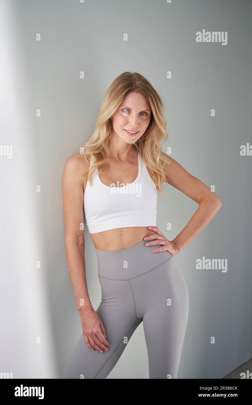 Healthy lifestyle standing hand on hip looking at camera hi-res stock ...