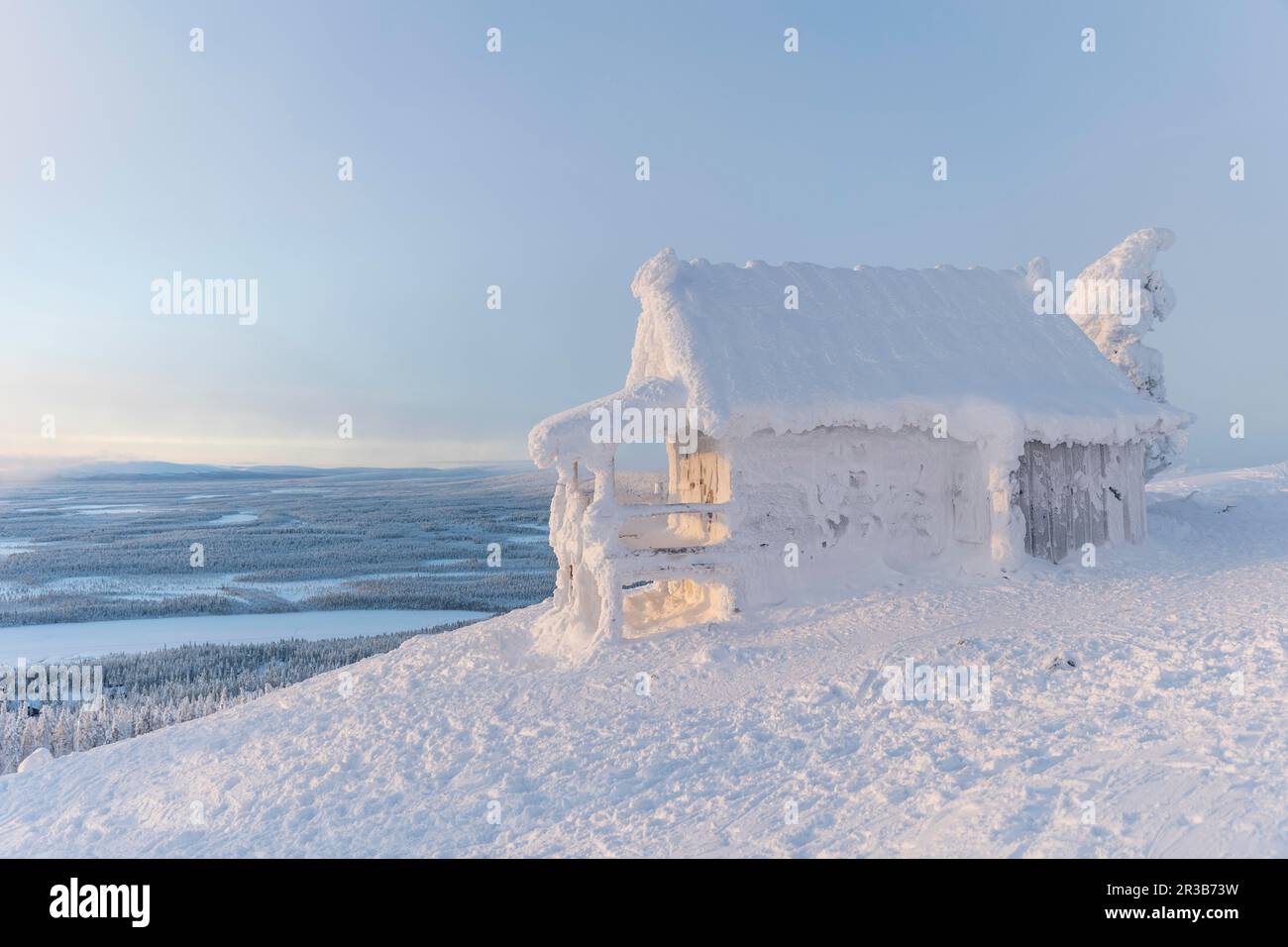 Snow-covered house in winter landscape Stock Photo - Alamy