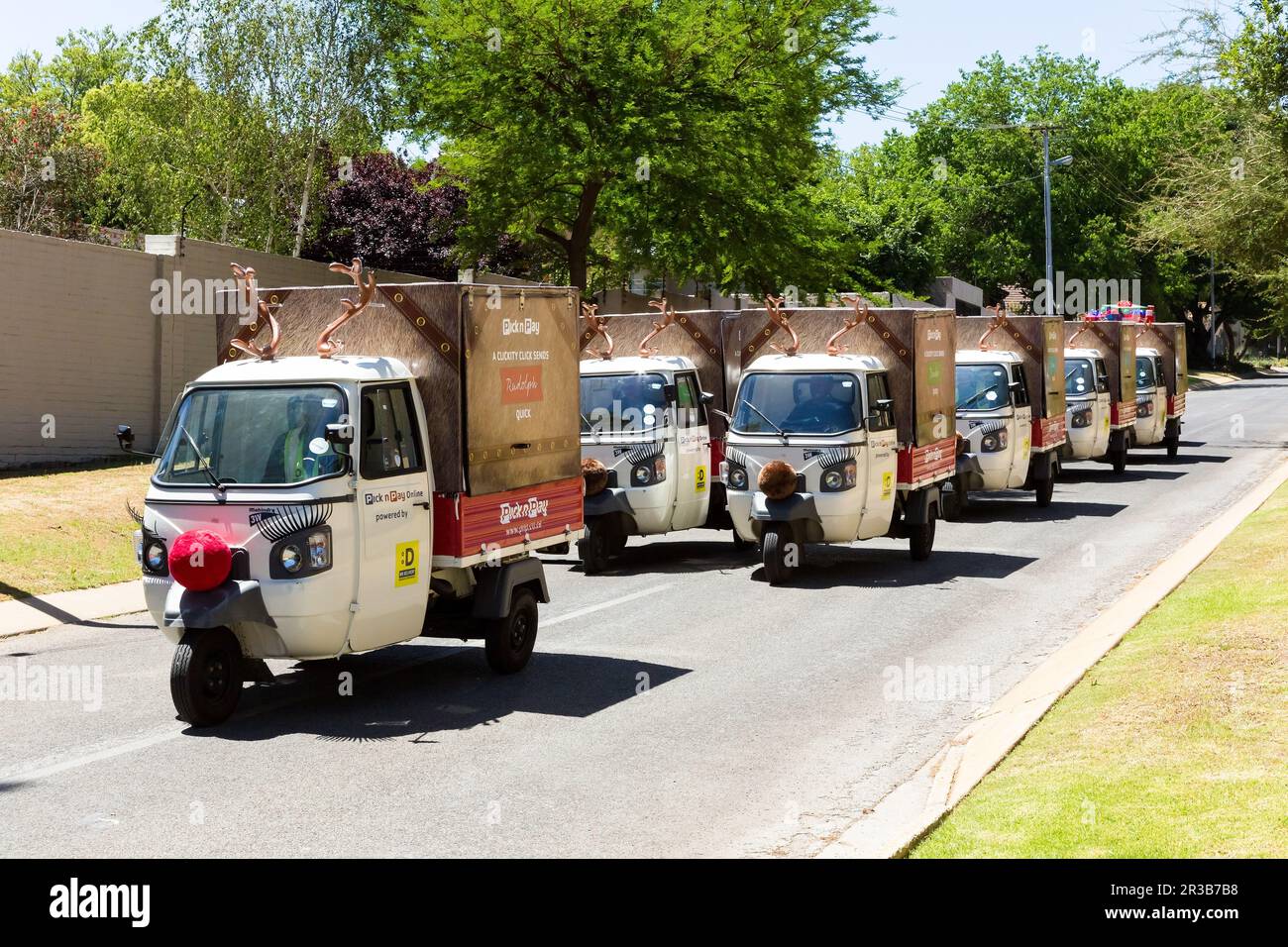 Small TukTuk Grocery Store Home Delivery Vehicles driving through ...
