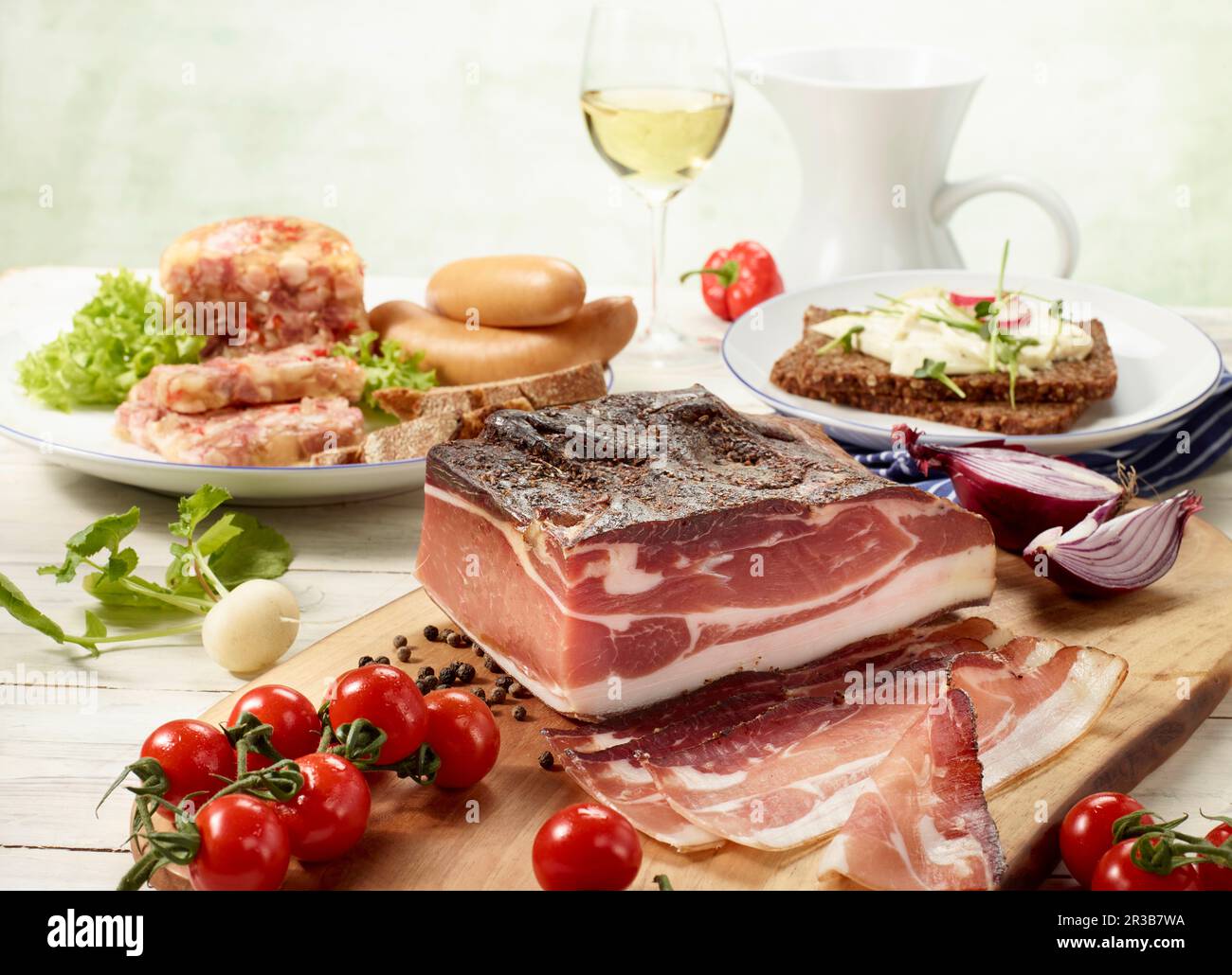 Air-dried Black Forest ham on a chopping board Stock Photo - Alamy
