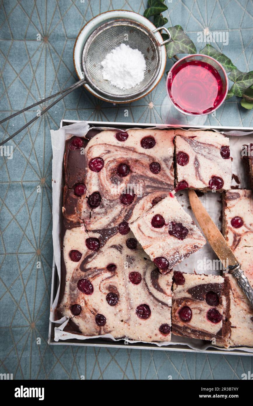 Vegan marble cake with sour cherries Stock Photo - Alamy