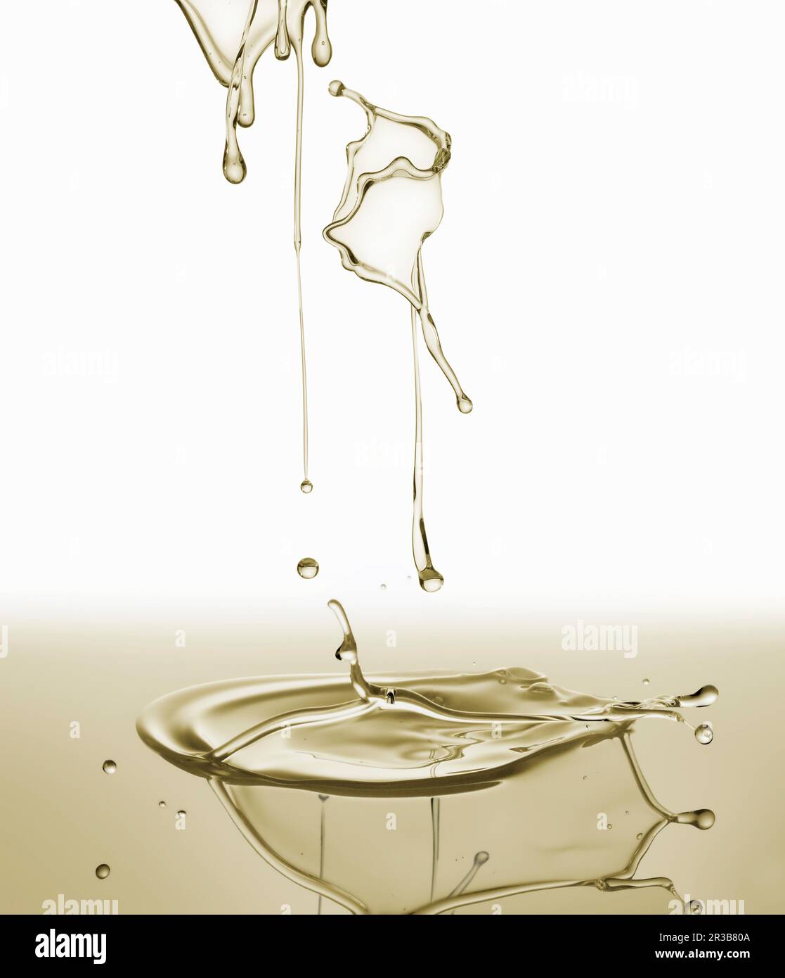 A splash of oil Stock Photo - Alamy