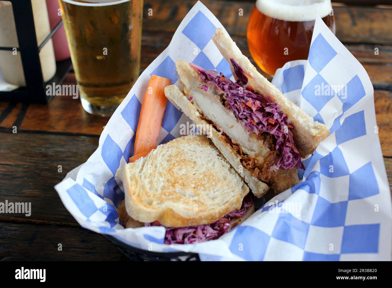 Chicken schnitzel sandwich at a German-style beer garden Stock Photo ...