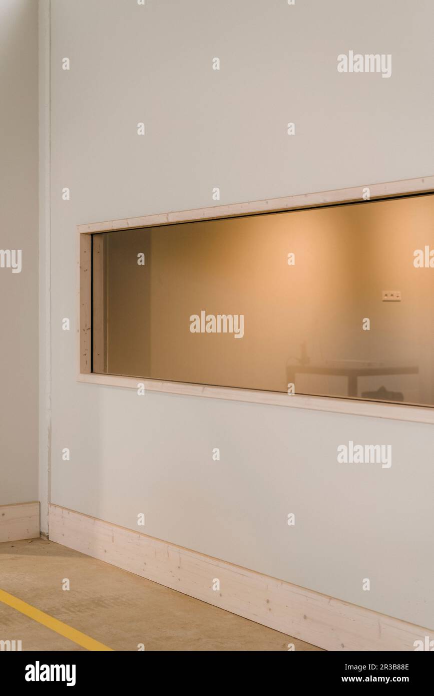 Glass window on wall in carpentry factory Stock Photo - Alamy