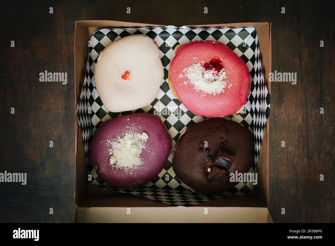Purple glaze donuts hi-res stock photography and images - Alamy