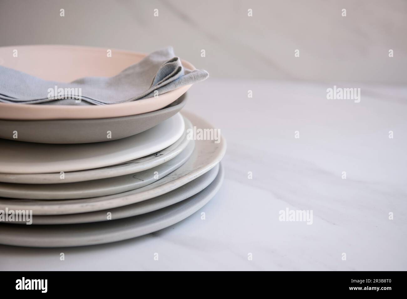 Plate Stack On Marble Stock Photo - Alamy