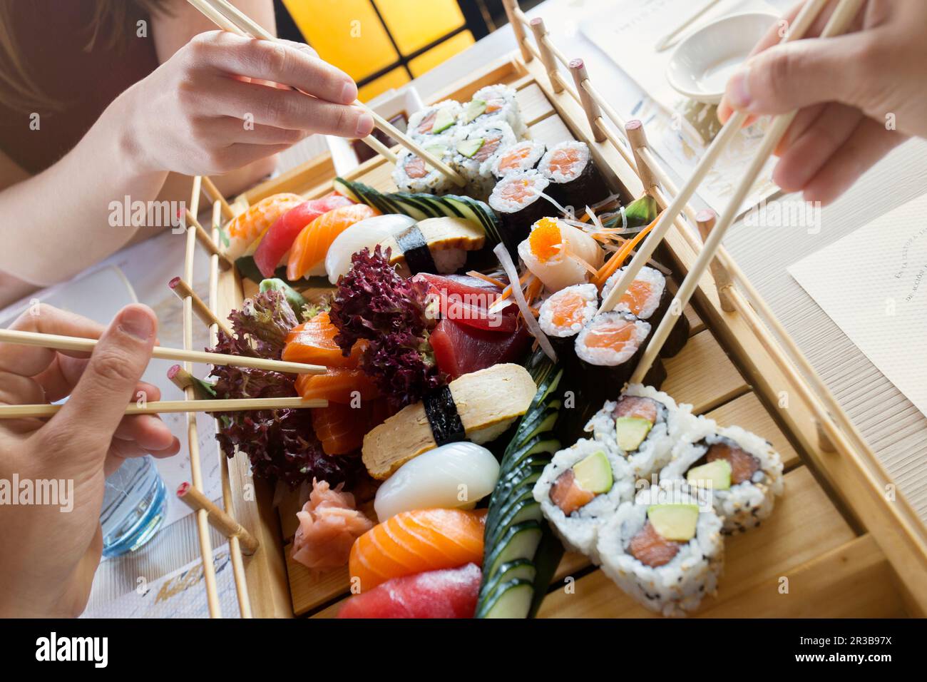 Picking food of platter hi-res stock photography and images - Alamy