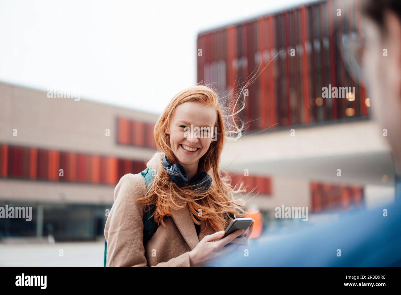 Woman holding smart bluetooth hi-res stock photography and images - Alamy