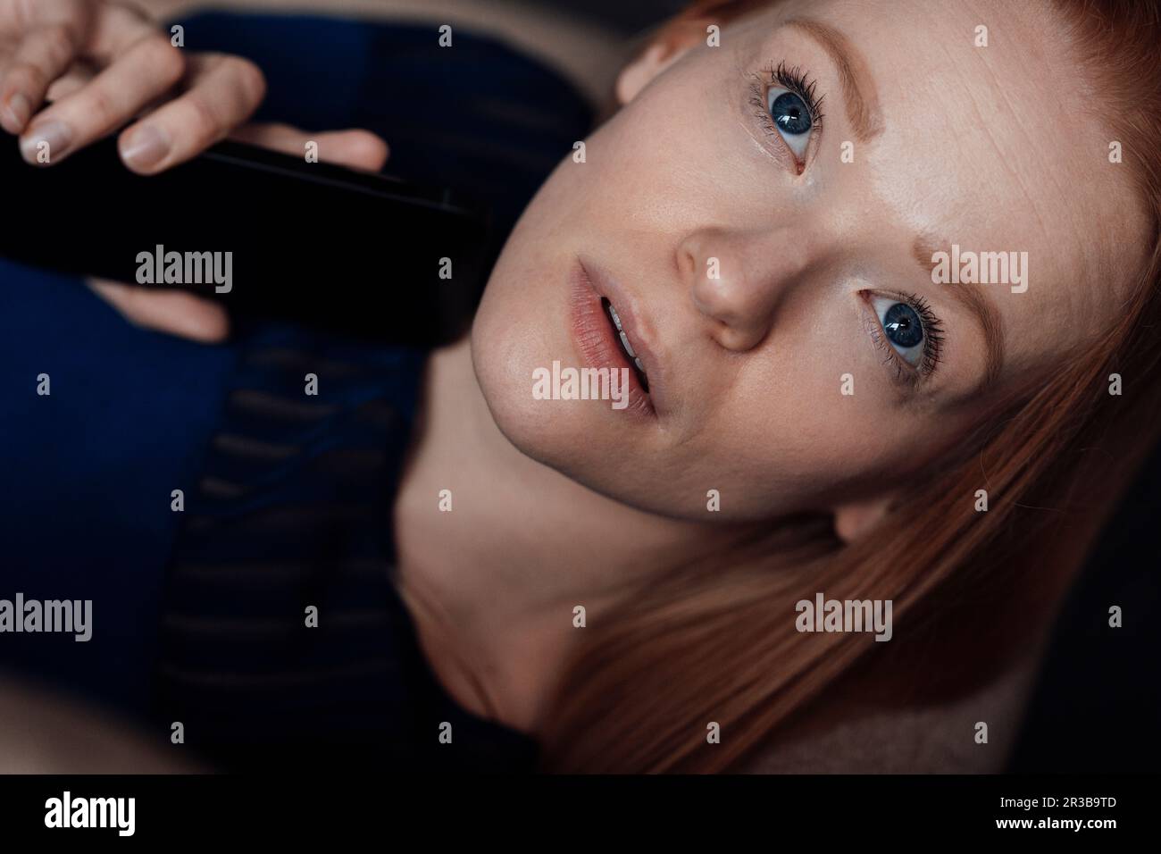 Holding phone up close face hi-res stock photography and images - Alamy