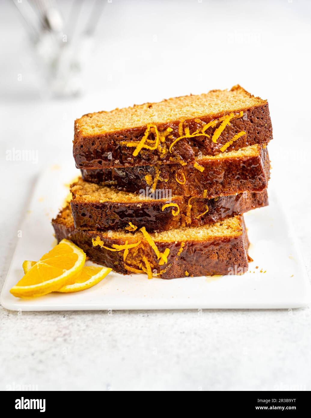 Syrup loaf cake with orange zest, sliced Stock Photo - Alamy