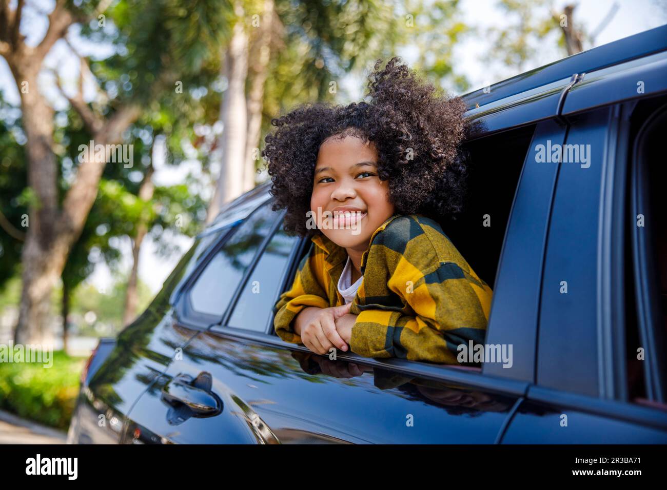Race car girl leaning hi-res stock photography and images - Alamy