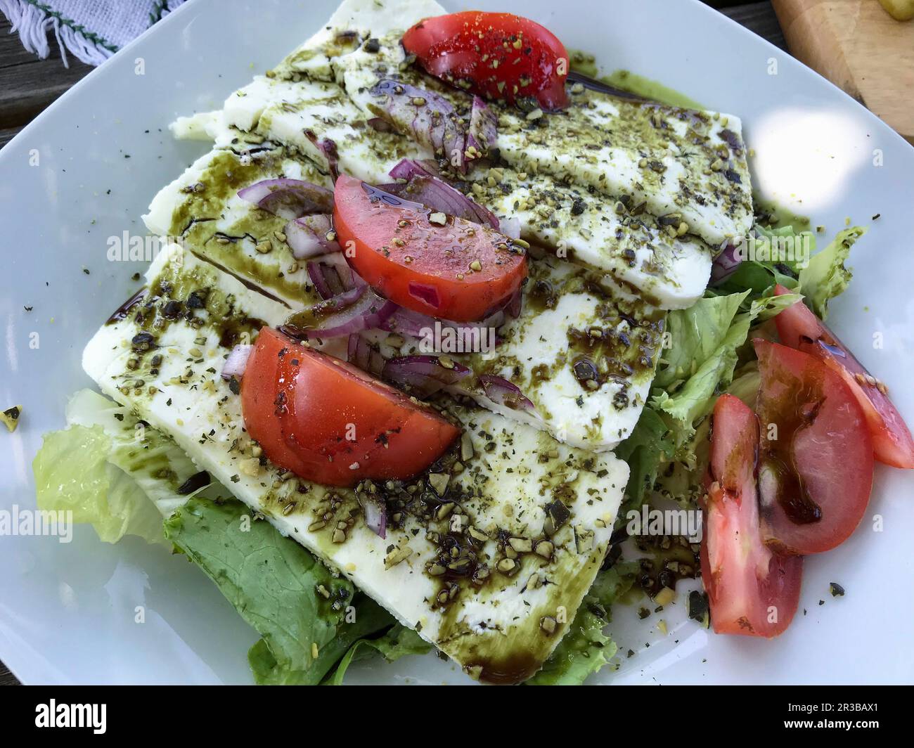 Styrian sheep's cheese salad with pumpkin seed oil Stock Photo - Alamy