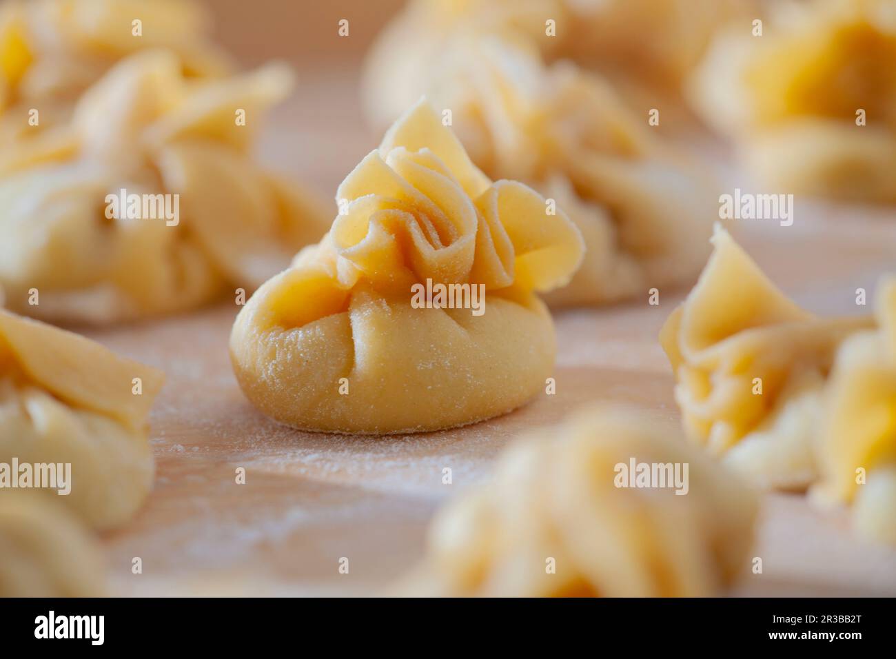 Dumplings on a floured work surface Stock Photo - Alamy