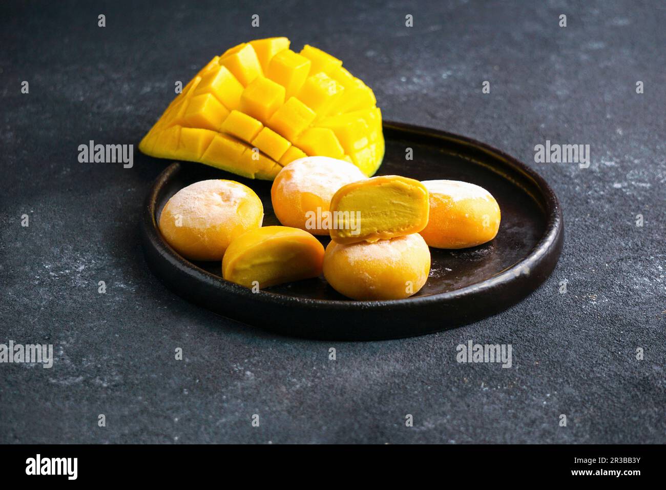 Closeup Of Mango Ice Cream Mochi Balls On Red Serving Dish, 47% OFF