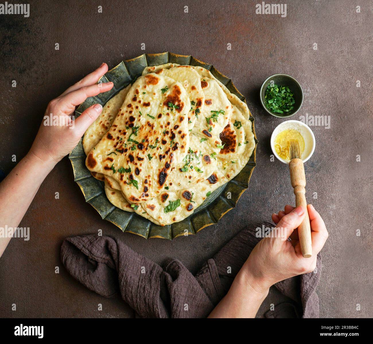 Naan - Indian garlic flat bread Stock Photo - Alamy
