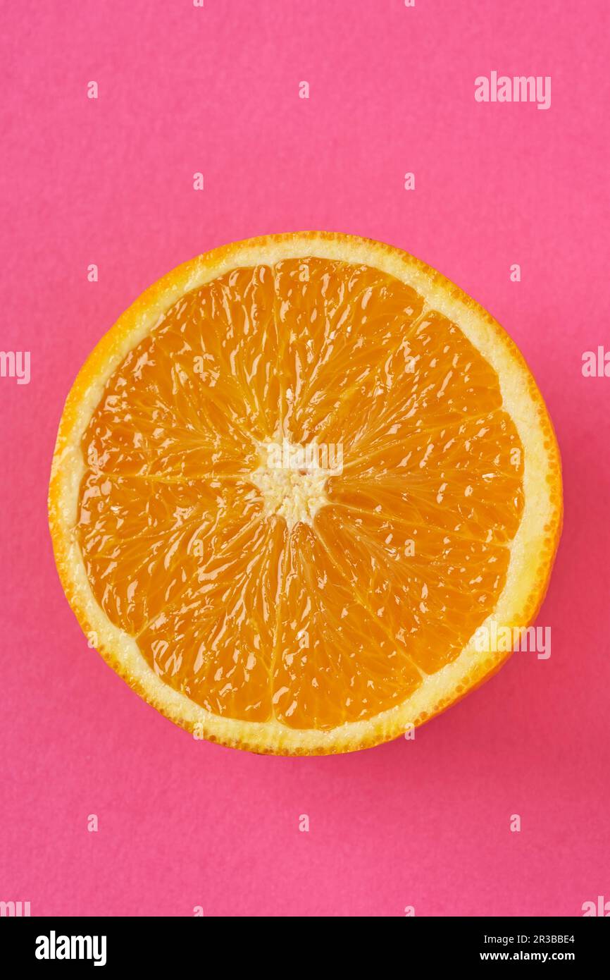 Half an orange Stock Photo - Alamy