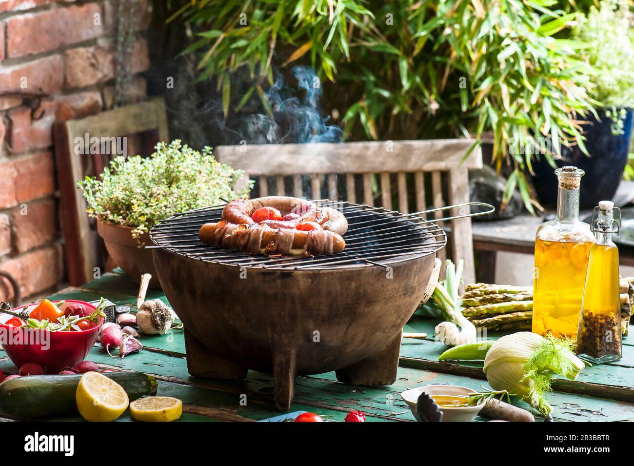Cooking on barbecue hi-res stock photography and images - Alamy