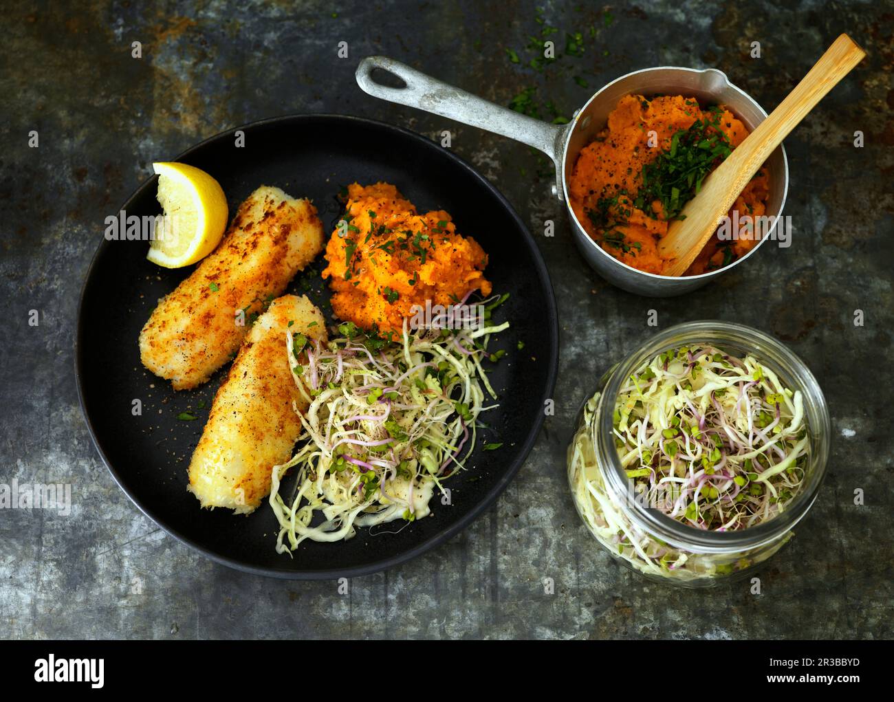 Fish fingers with sweet potatoe mash Stock Photo - Alamy