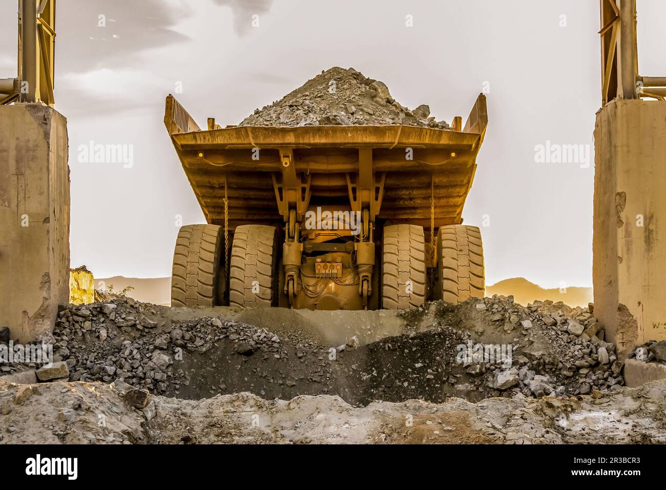 Mining dump trucks transporting Platinum ore for processing Stock Photo ...