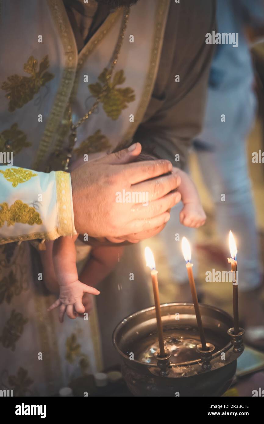 Child hand holy water hi-res stock photography and images - Alamy