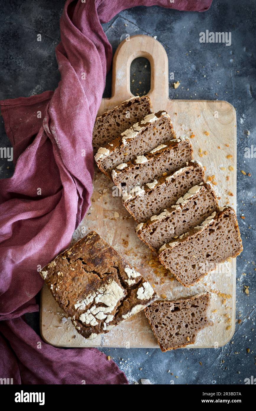 Sourdough bread in a mold whole grain flour slices of bread Stock Photo ...