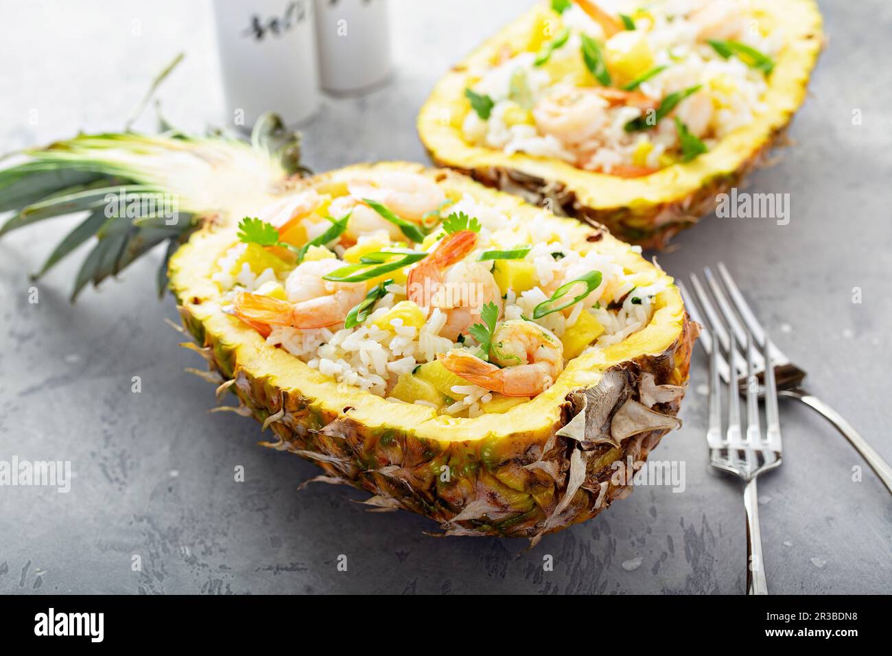 Shrimp pineapple rice served in a fresh pineapple Stock Photo - Alamy