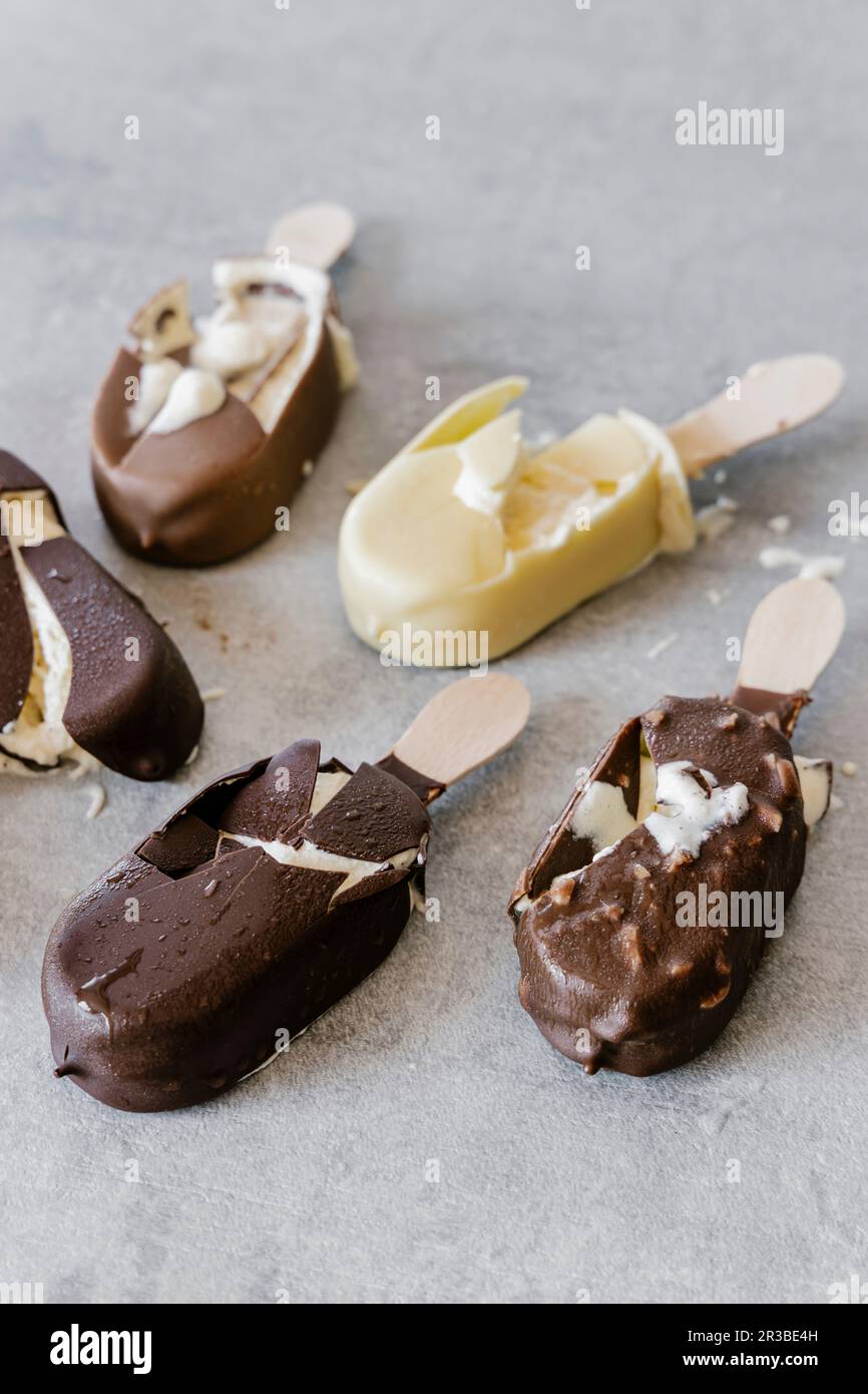 Assorted mini ice creams on sticks, crushed Stock Photo - Alamy