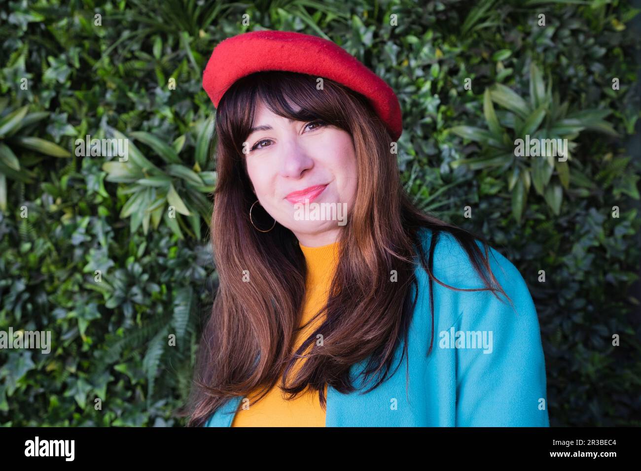 Women wearing turquoise color hi-res stock photography and images - Alamy