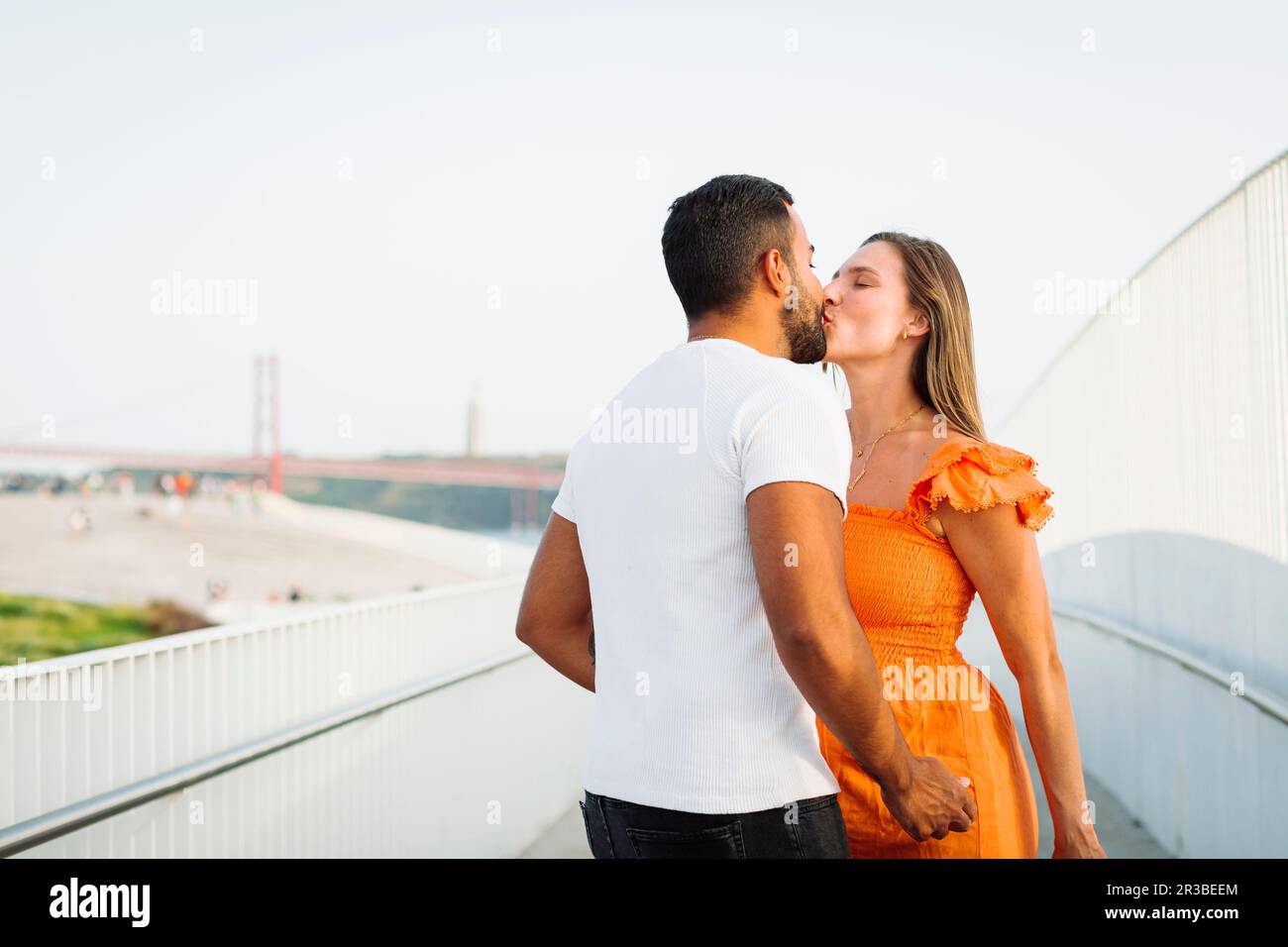 Two women kissing each other hi-res stock photography and images - Alamy