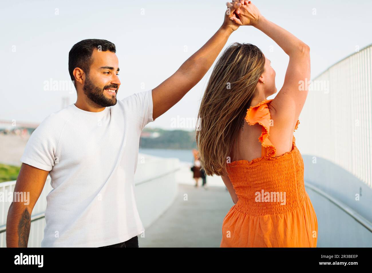Smiling man dancing pregnant hi-res stock photography and images - Alamy
