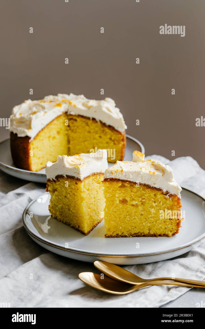 Single-layer turmeric cake with classic cream-cheese frosting Stock ...