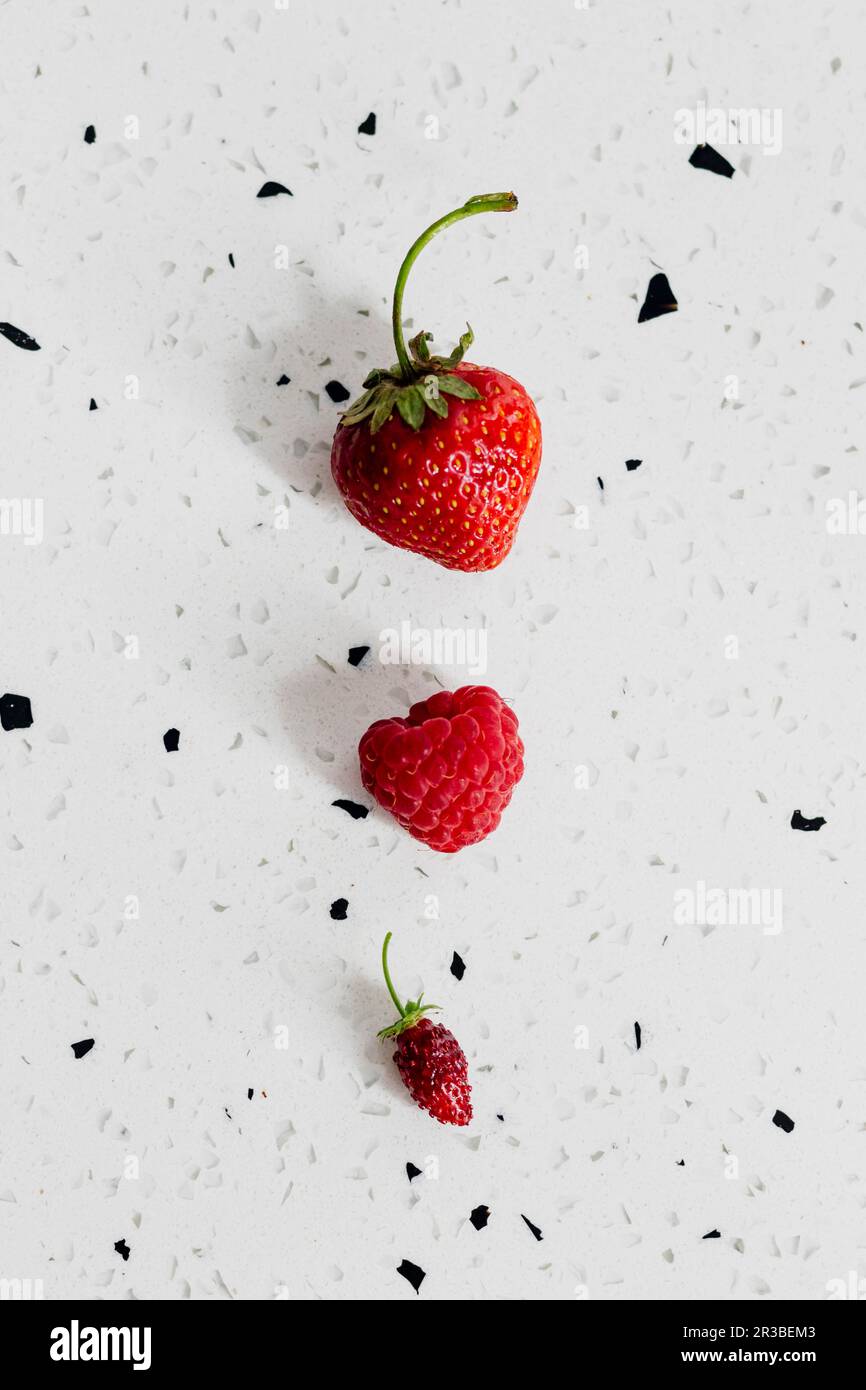 Strawberry, raspberry and wild strawberry Stock Photo - Alamy